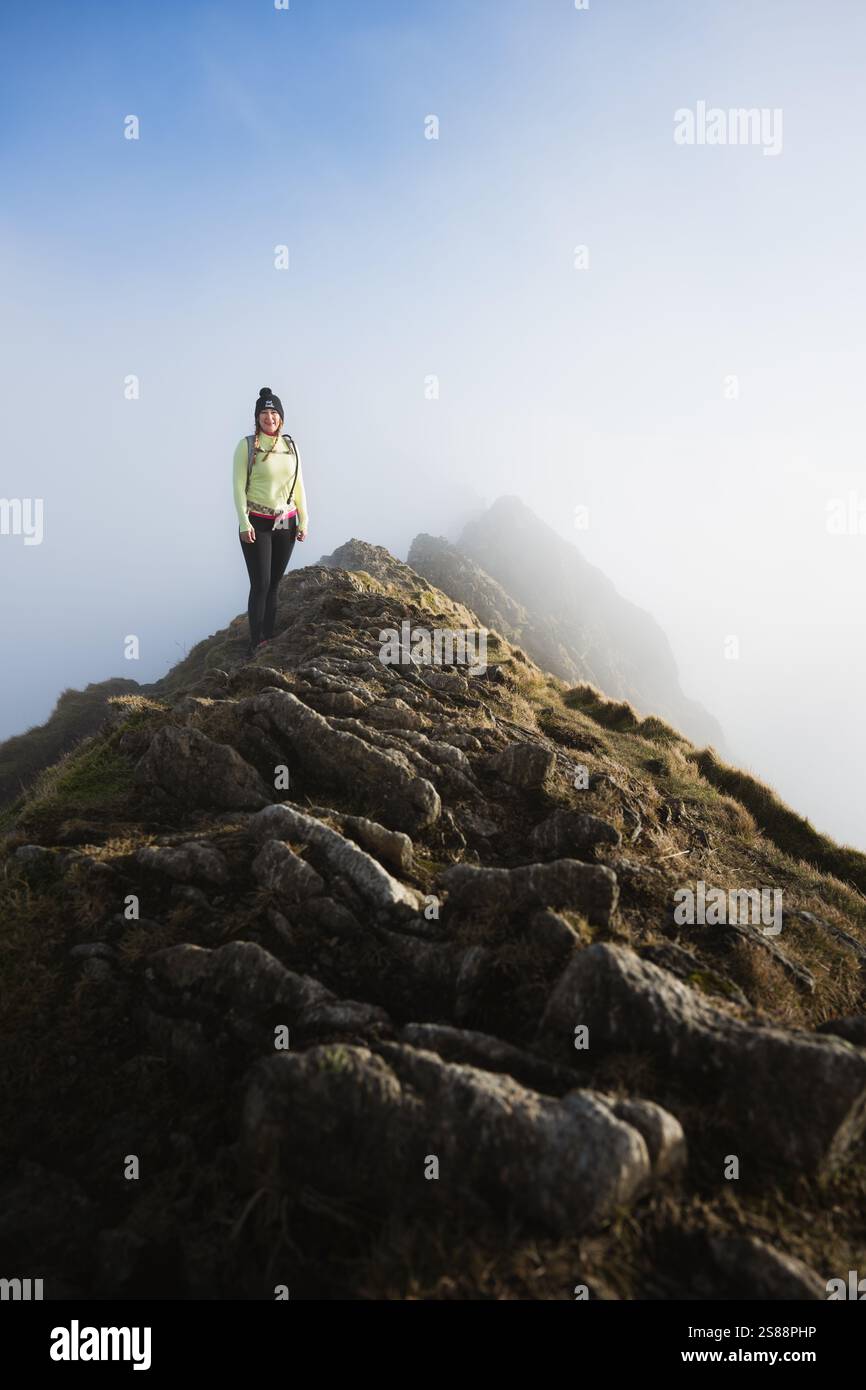 Female hiker, hiking Striding Edge, Helvellyn, the lake district Stock ...