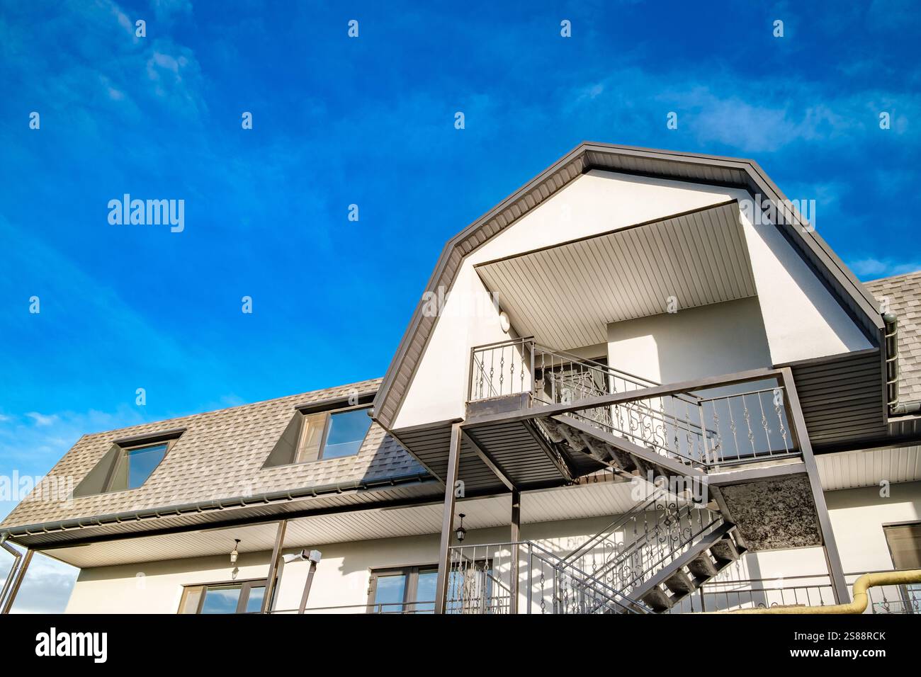 two-storey apartment building with stairs and attic Stock Photo - Alamy