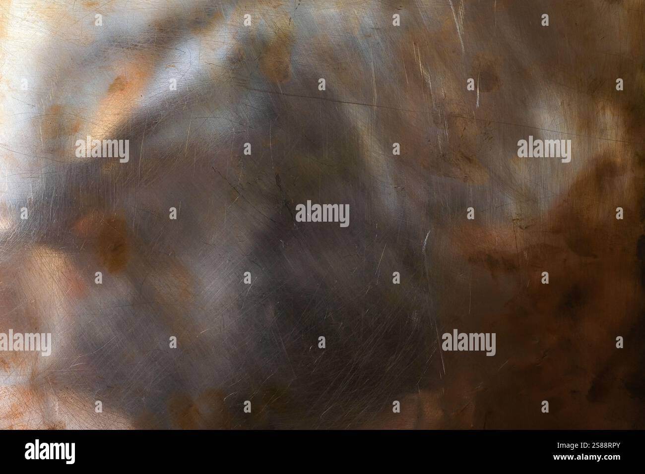 Aggressive rough copper background with reflections of orange and blue ...