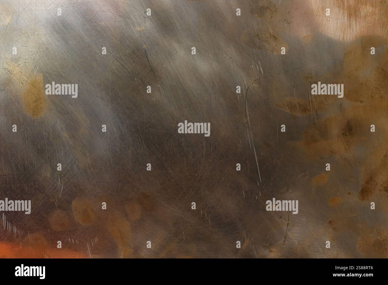 Aggressive rough copper background with reflections of orange and blue ...