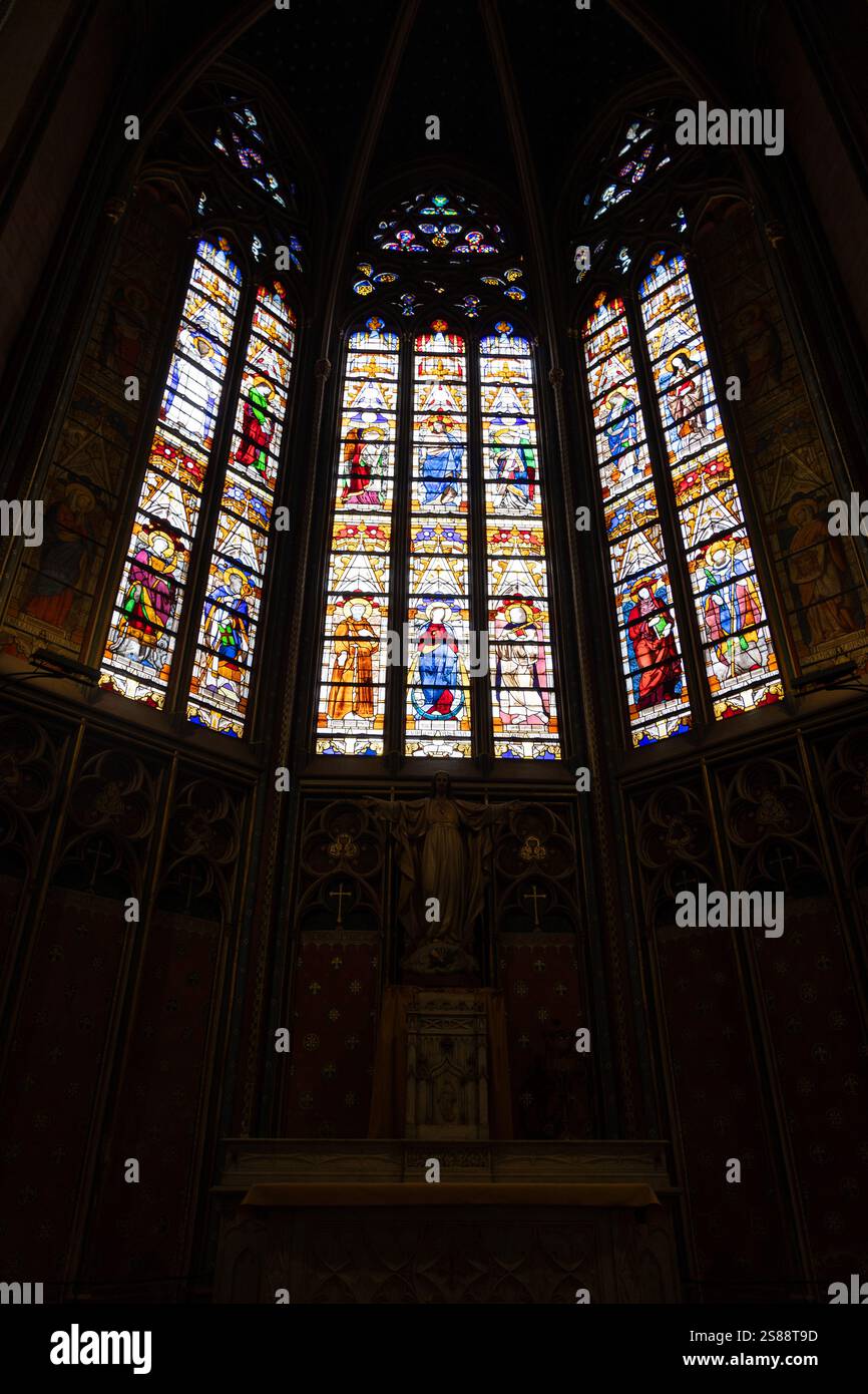 A mesmerizing view of vibrant stained glass windows inside a historic ...