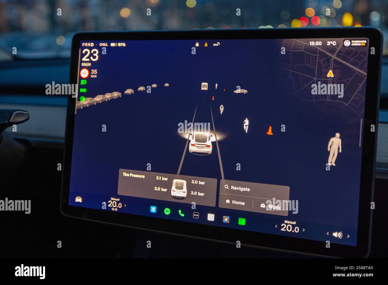 Tesla Model Y touchscreen display showing autopilot visualization with ...