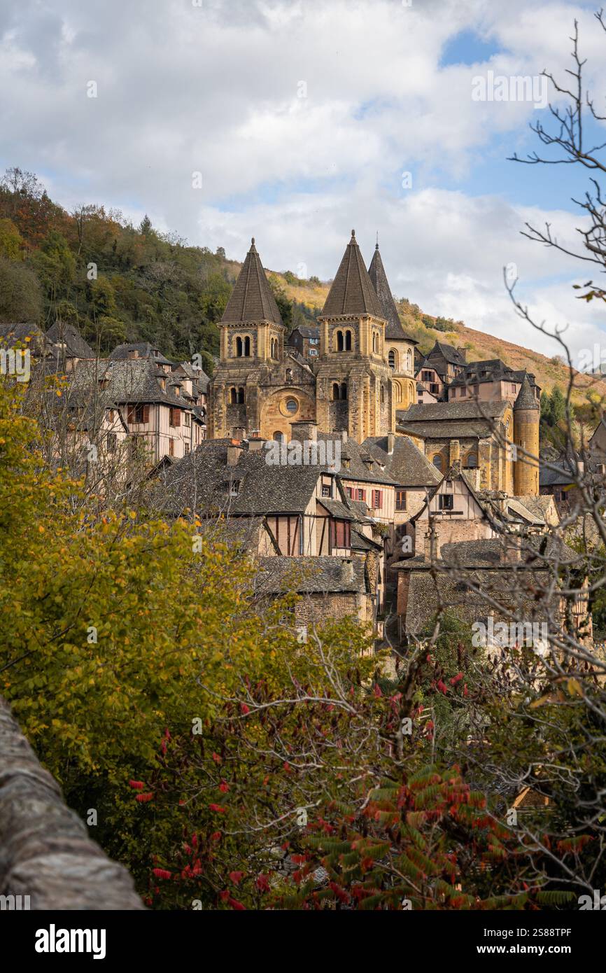 Scenic autumn view of the historic village of Conques in Aveyron ...
