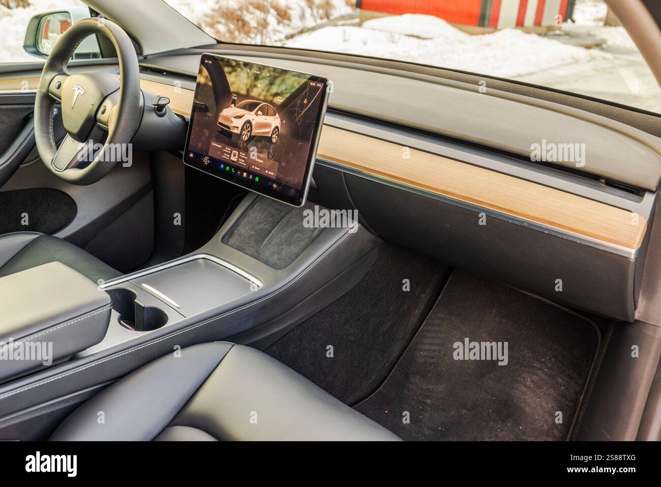 Tesla Model Y interior featuring minimalist dashboard, touchscreen ...