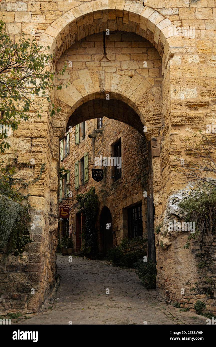 Close-up view of a medieval stone archway in Cordes-sur-Ciel, Occitanie ...