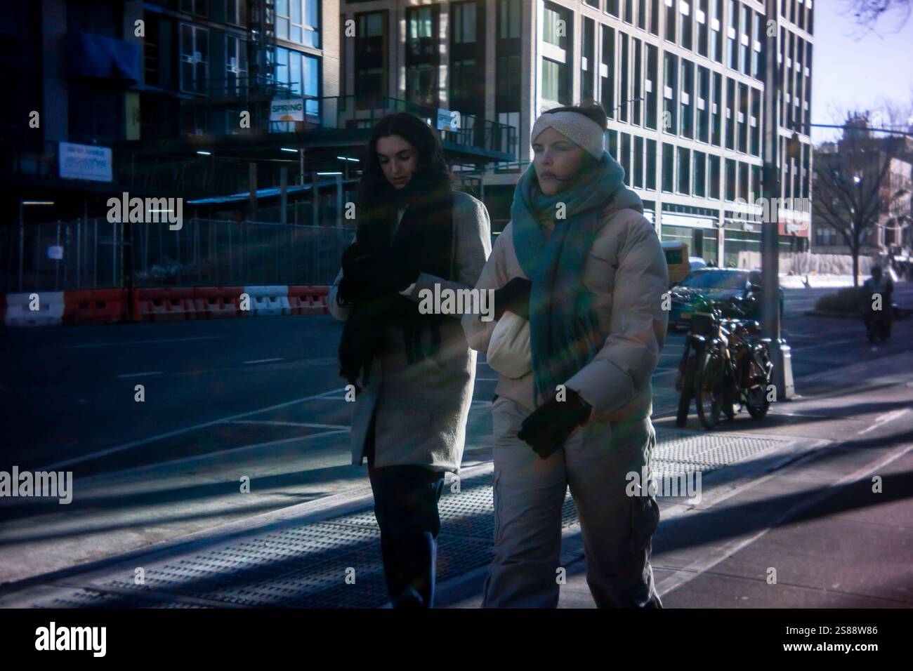 People in Chelsea weather the cold temperatures and the biting wind ...