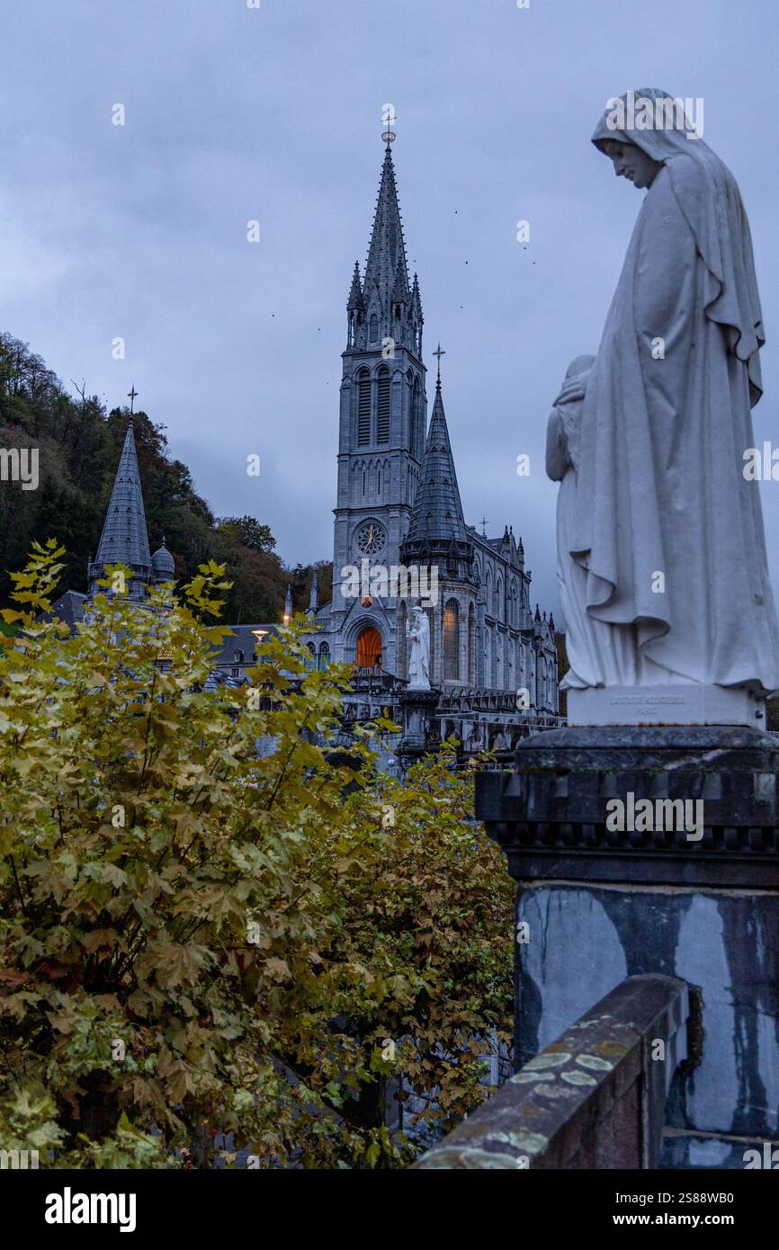 Serene view of the Virgin Mary statue with the Basilica of the ...
