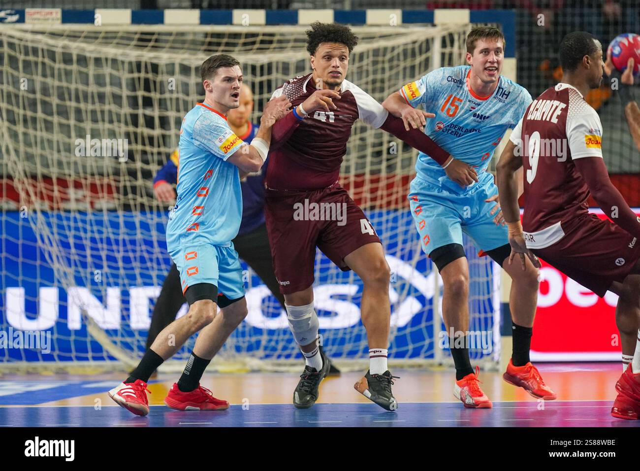 VARAZDIN, CROATIA - JANUARY 21: Lars Kooij of The Netherlands defends Youssef Altaieb Ali of ...