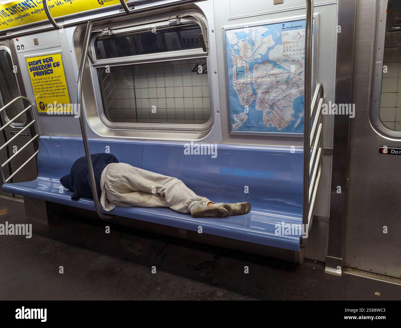 Sleeping homeless on a “E” train in New York on Sunday, January 12 ...
