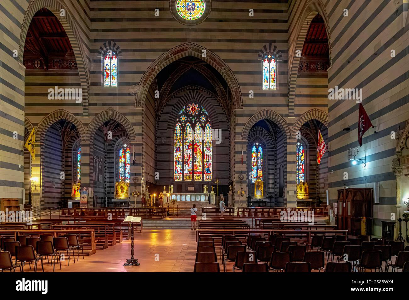 Stained glass windows and the main altar inside The Basilica of San ...