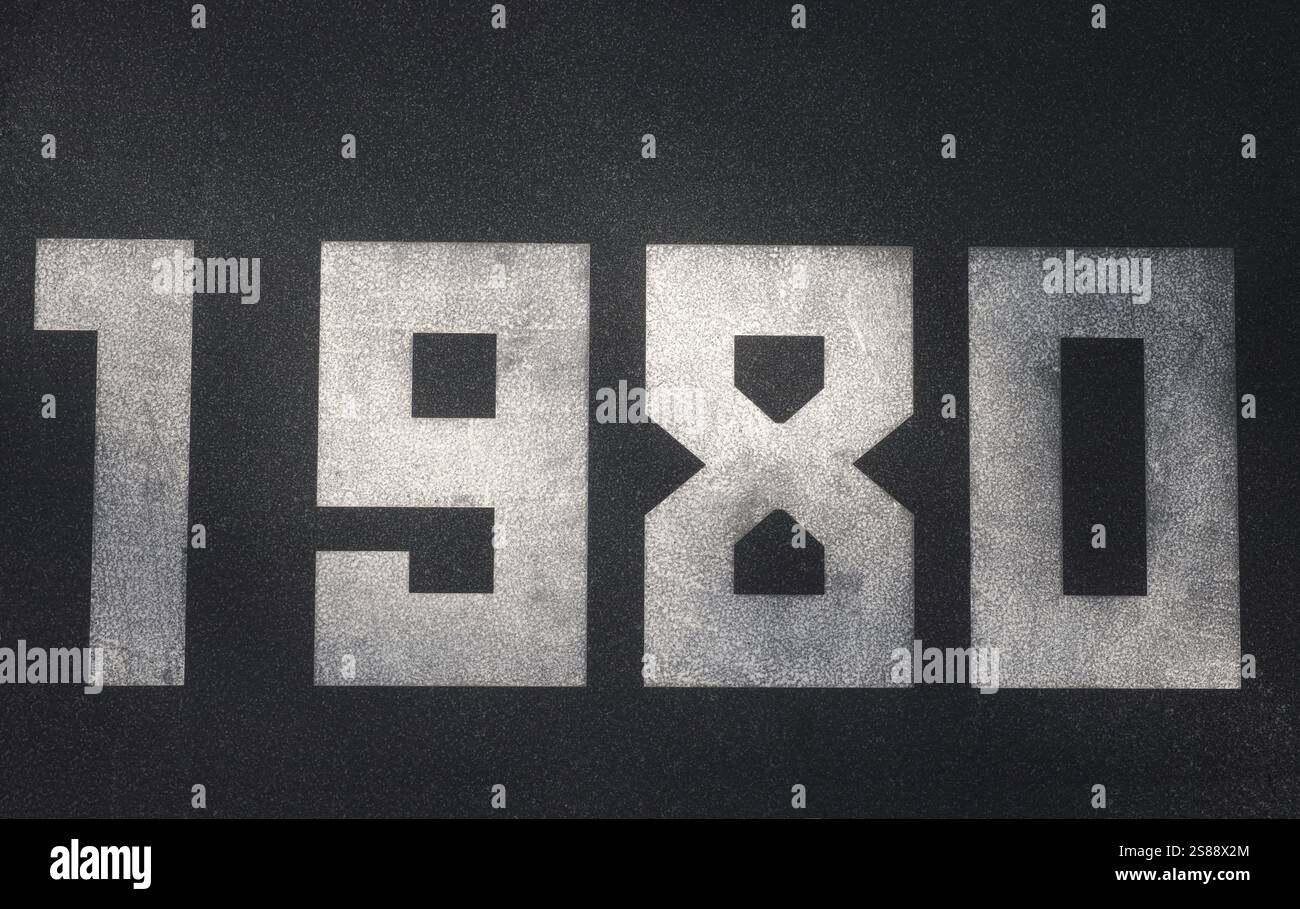 Black granite slab with white numbers 1980 on it Stock Photo - Alamy