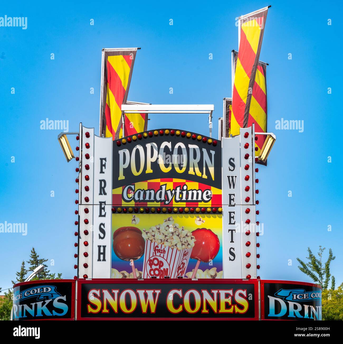 Fairgrounds exhibition with games, rides and signs at CNE Toronto ...