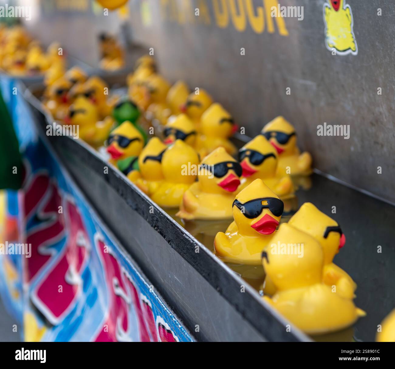 Fairgrounds exhibition with games, rides and signs at CNE Toronto ...