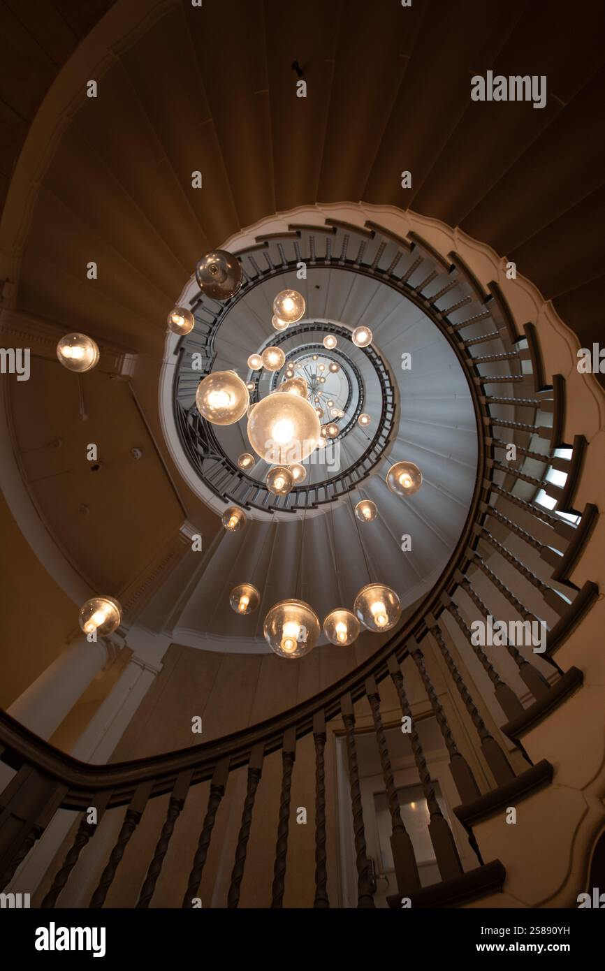 Spiral staircase, lights, elegant design Stock Photo - Alamy