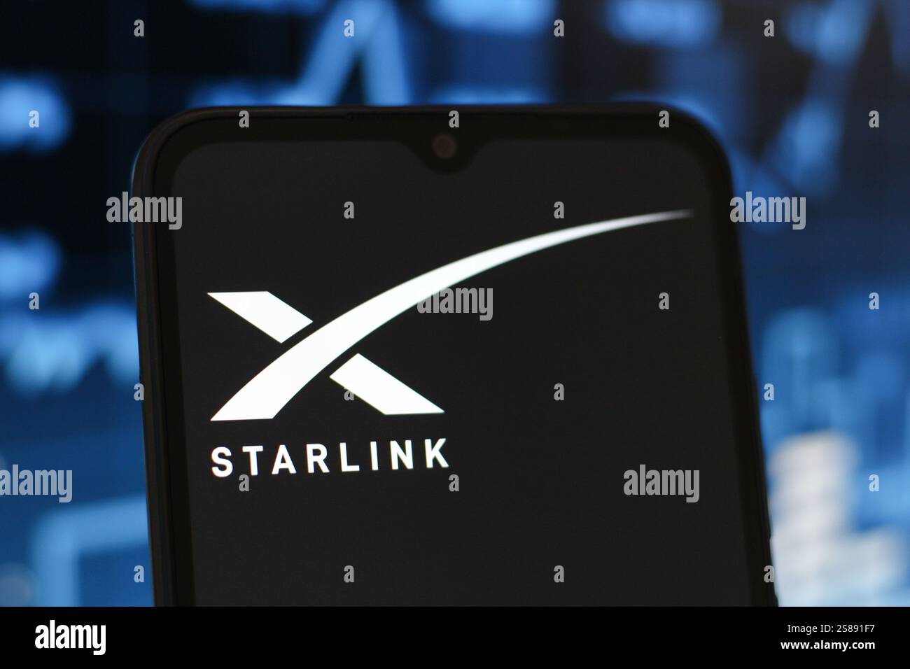 In this photo illustration, the Starlink logo is seen displayed on a ...