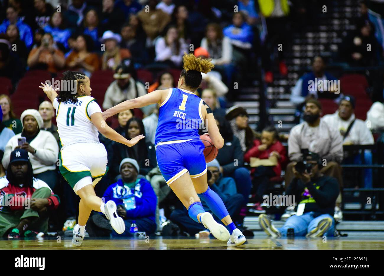Newark, USA. 20th Jan, 2025. UCLA's Kiki Rice (1) and Baylor's Jada ...