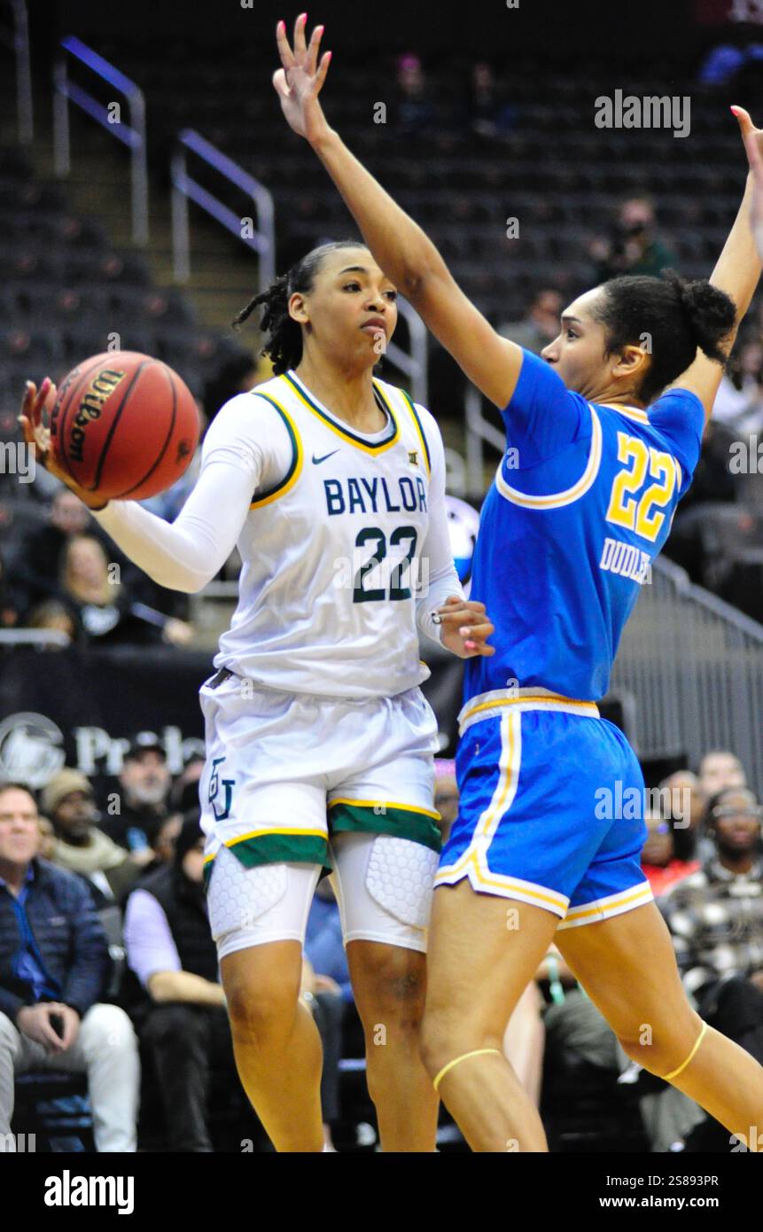 Newark, USA. 20th Jan, 2025. UCLA's Kendall Dudley (22) and Baylor's ...