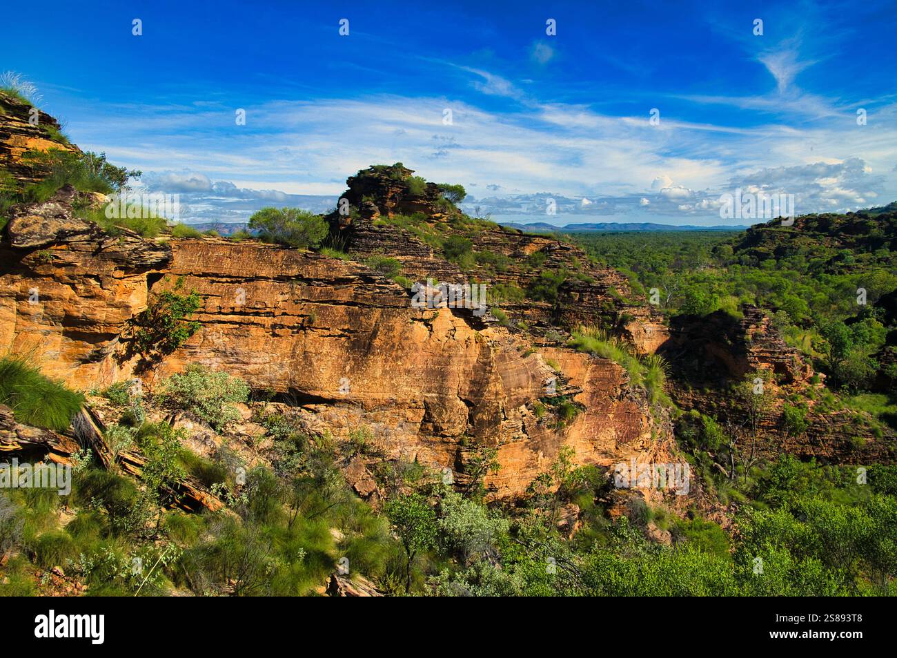 Layered red sandstone rocks in the remote wilderness of Mirima National ...