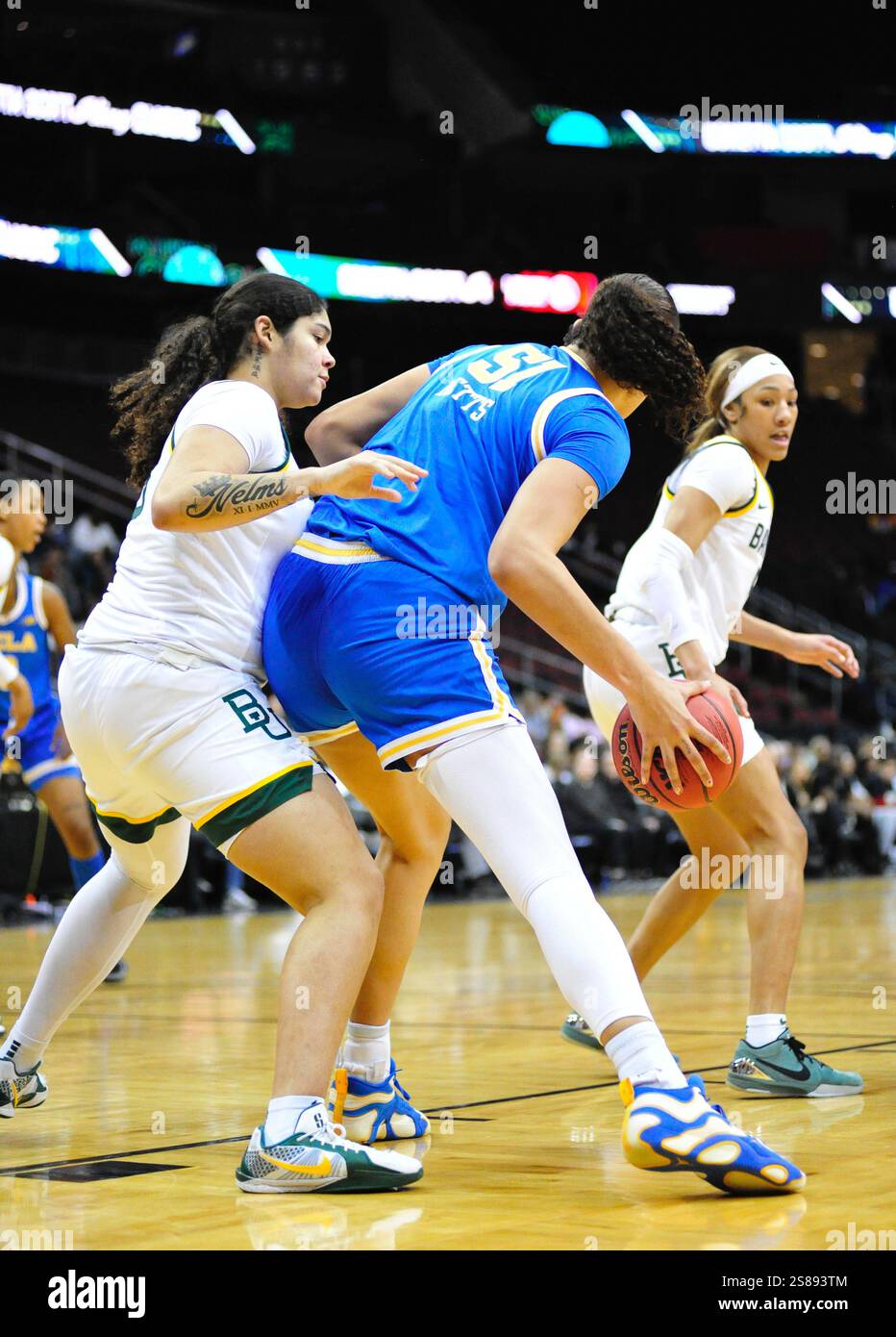 UCLA's Lauren Betts (51) drrives the lane at Prudential Center in the ...