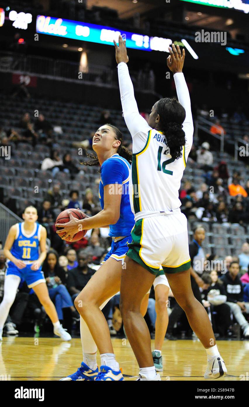 UCLA's Lauren Betts (51) persists over Baylor's Kyla Abraham (12) at ...
