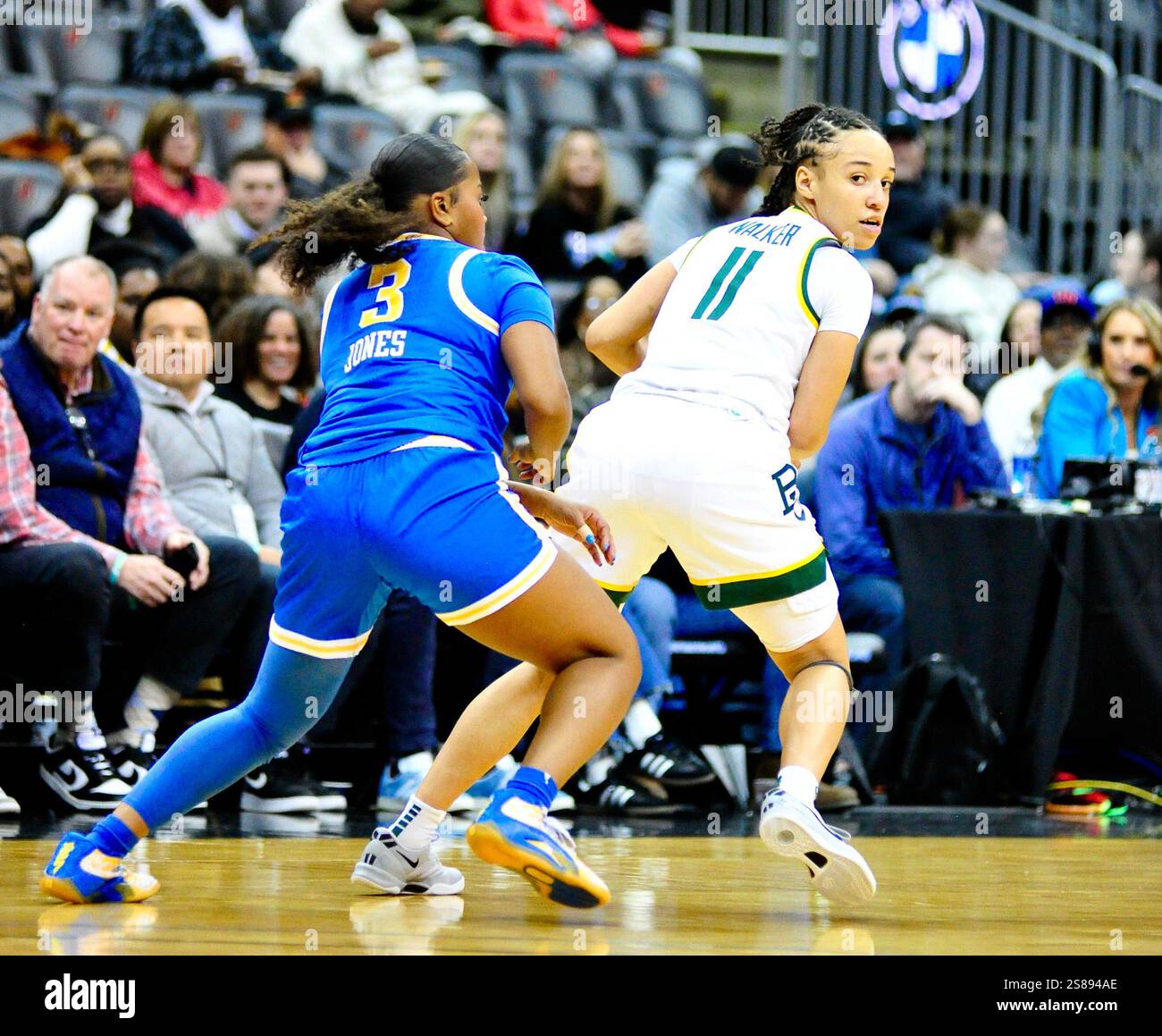 Newark, USA. 20th Jan, 2025. Baylor's Jada Walker (11) and UCLA's ...