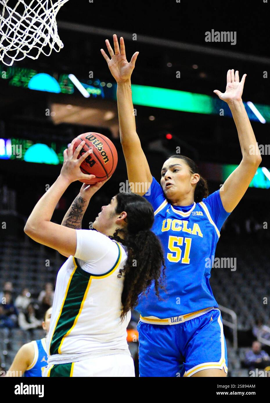 Newark, USA. 20th Jan, 2025. UCLA's Lauren Betts (51) defends at ...