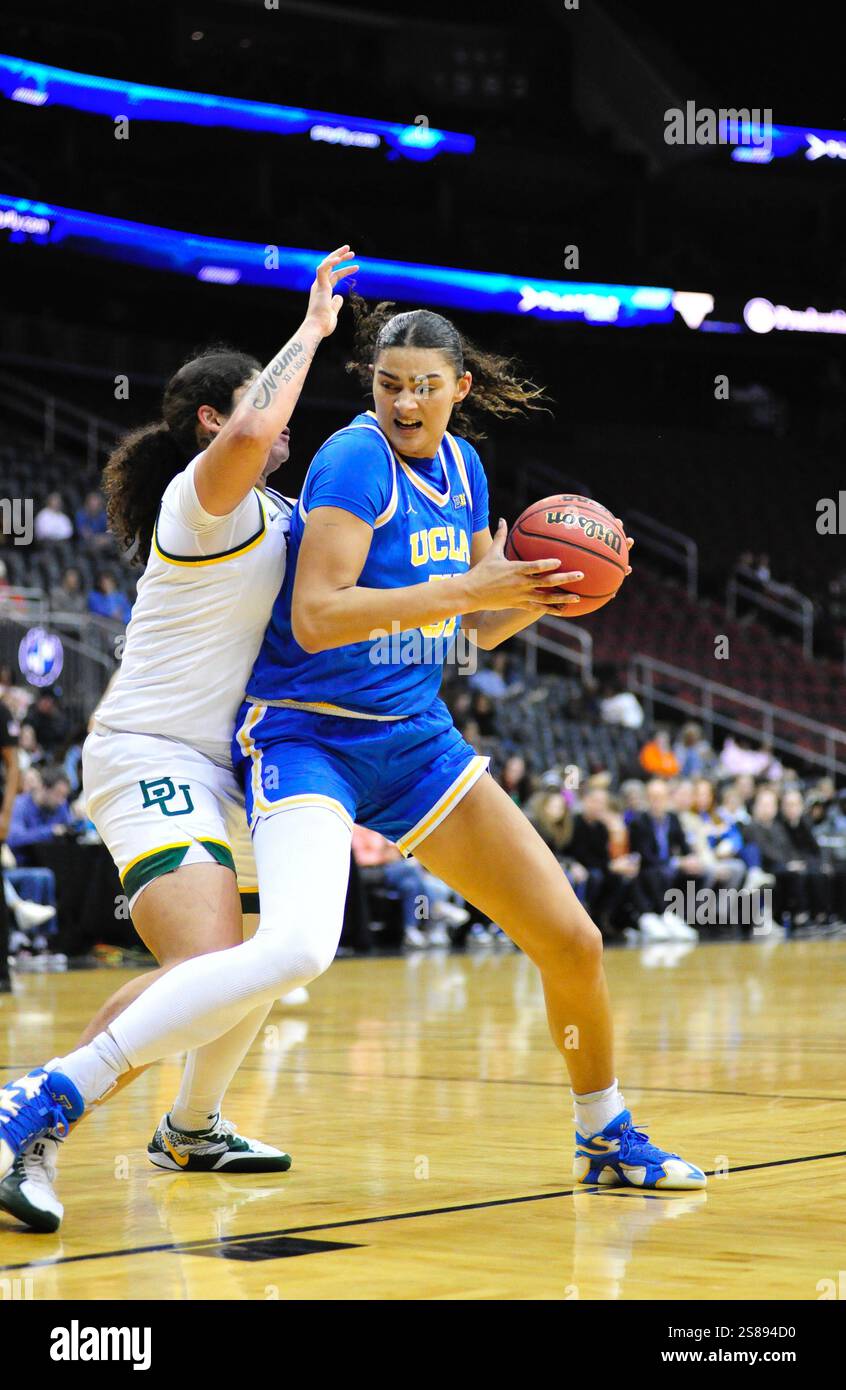 Newark, USA. 20th Jan, 2025. UCLA's Lauren Betts (51) drives the lane ...