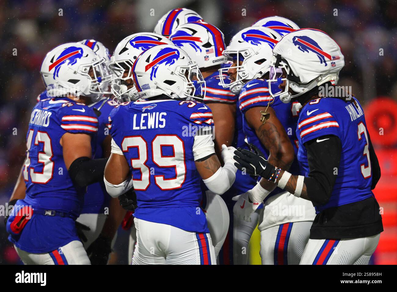 Buffalo Bills cornerback Cam Lewis (39) listens in during a huddle ...