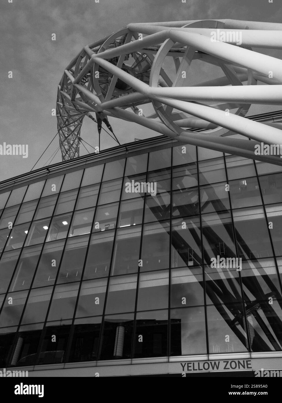 Modern stadium structure, reflected in glass, yellow zone Stock Photo ...