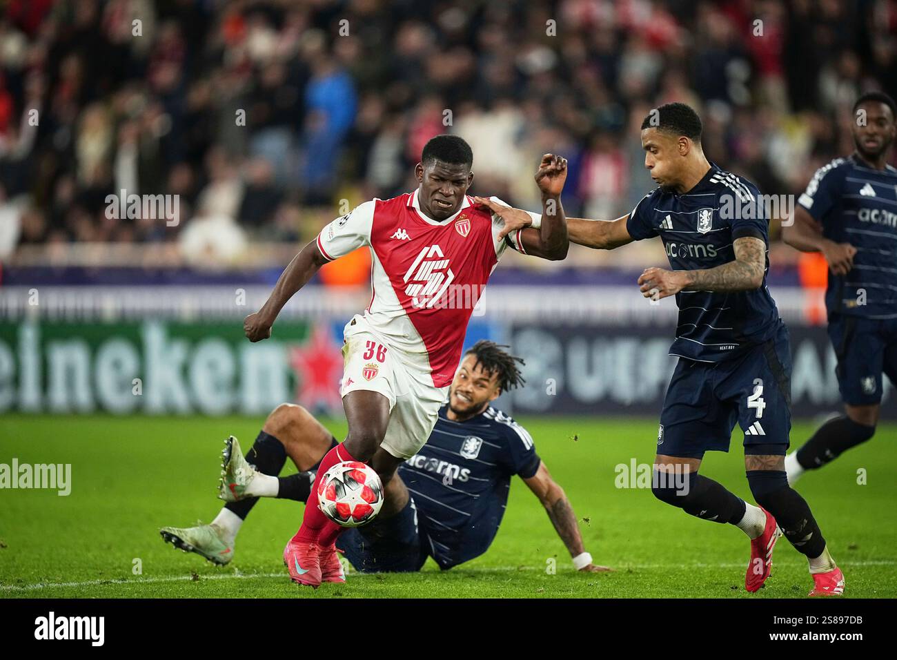Monaco's Breel Embolo, left, and Aston Villa's Ezri Konsa fight for the ...