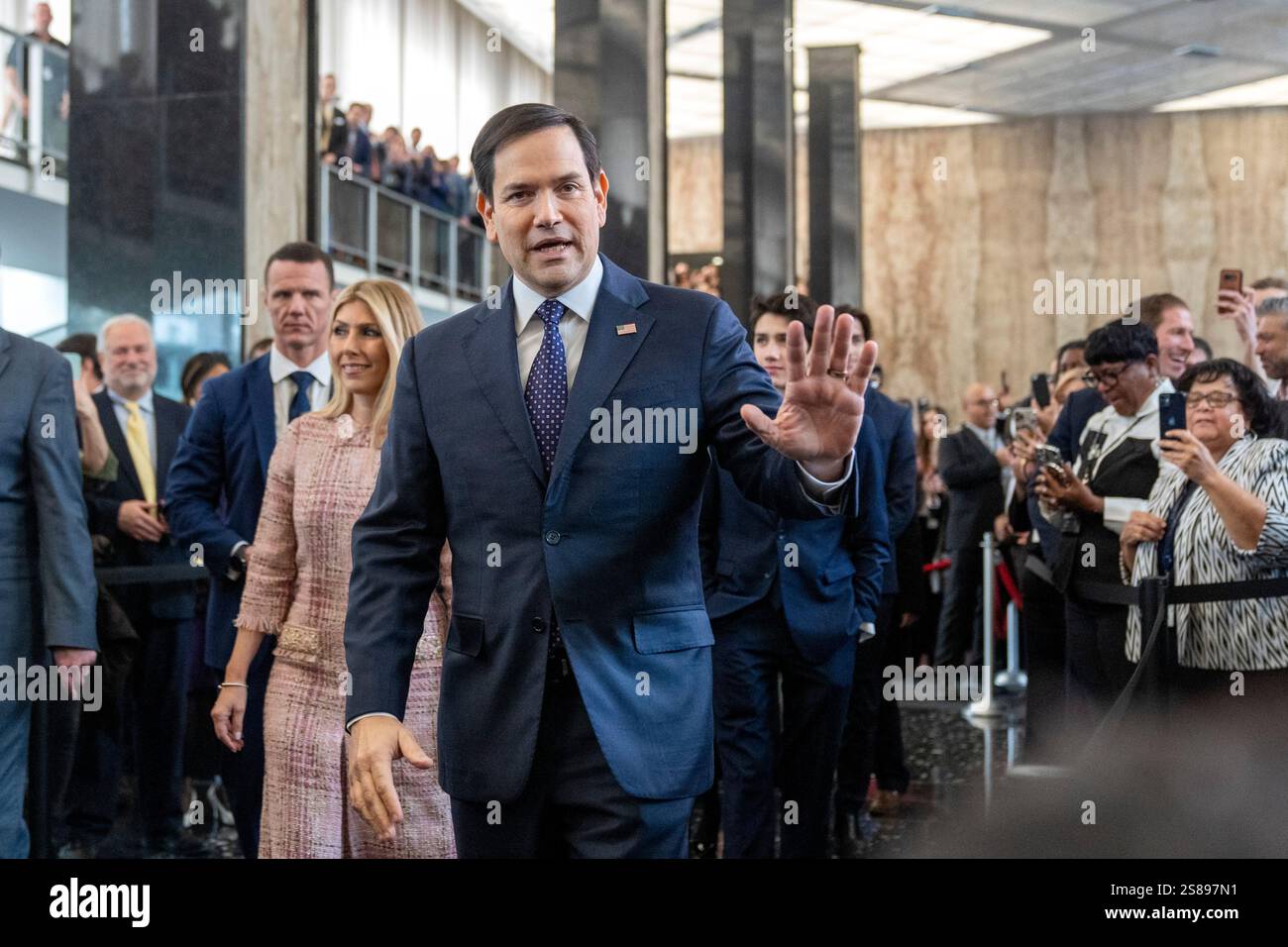 Secretary of State Marco Rubio greets people as he arrives to speak to ...