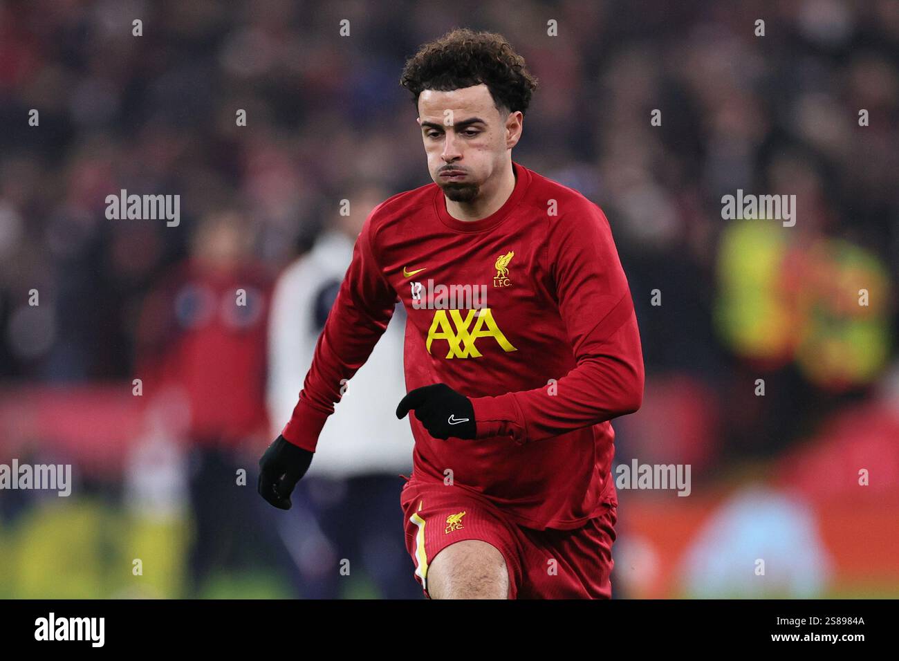 Liverpool, UK. 21st Jan, 2025. Curtis Jones of Liverpool warms up ahead ...