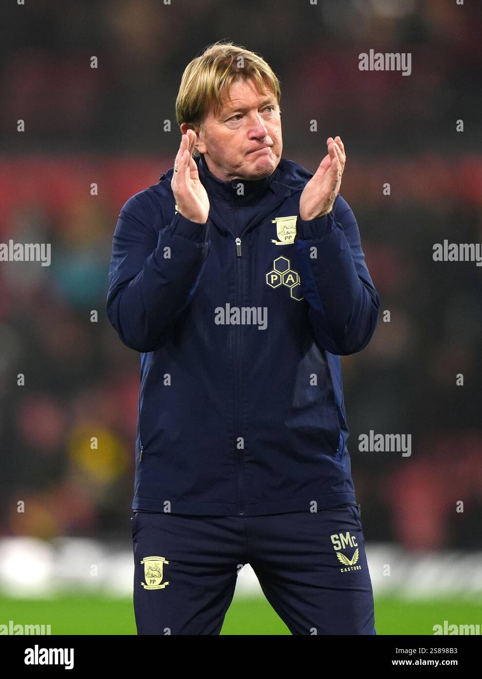 Preston North End assistant manager Stuart McCall applauds the fans ...