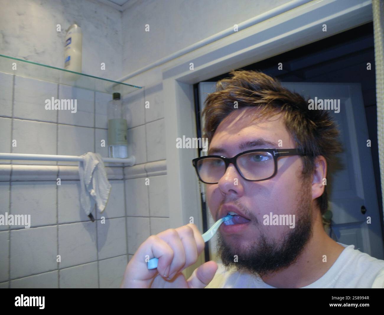 Copenhagen, Denmark. 28th Sep, 2024. View of man brushing his teeth ...