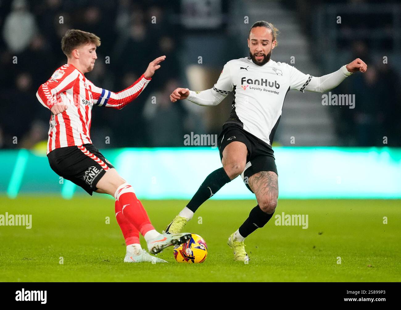 Sunderland's Dan Neil (left) and Derby County's Marcus Harness battle ...
