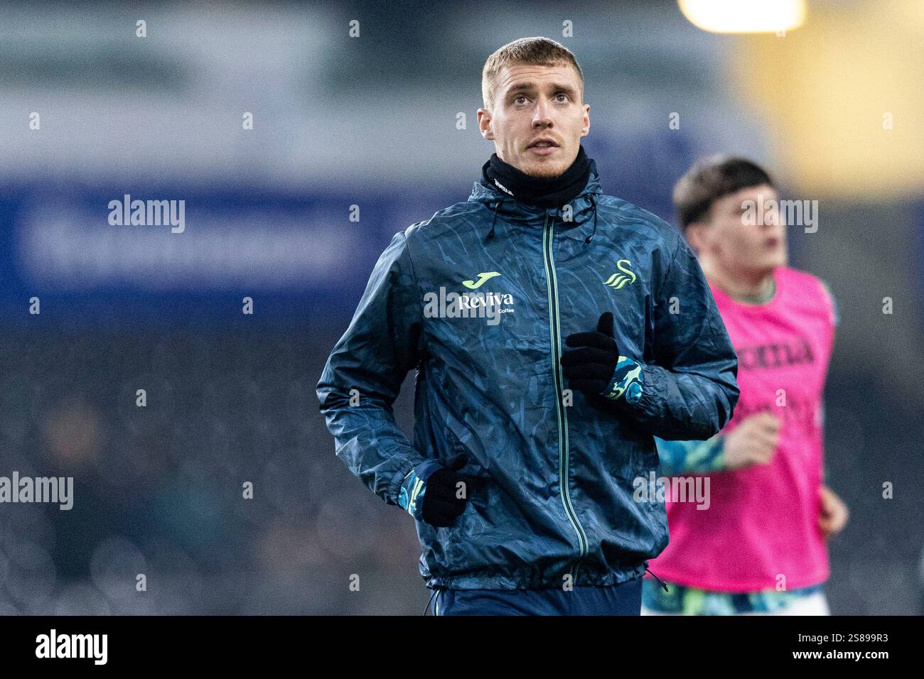 Swansea, UK. 21st Jan, 2025. Jay Fulton of Swansea City during the warm ...