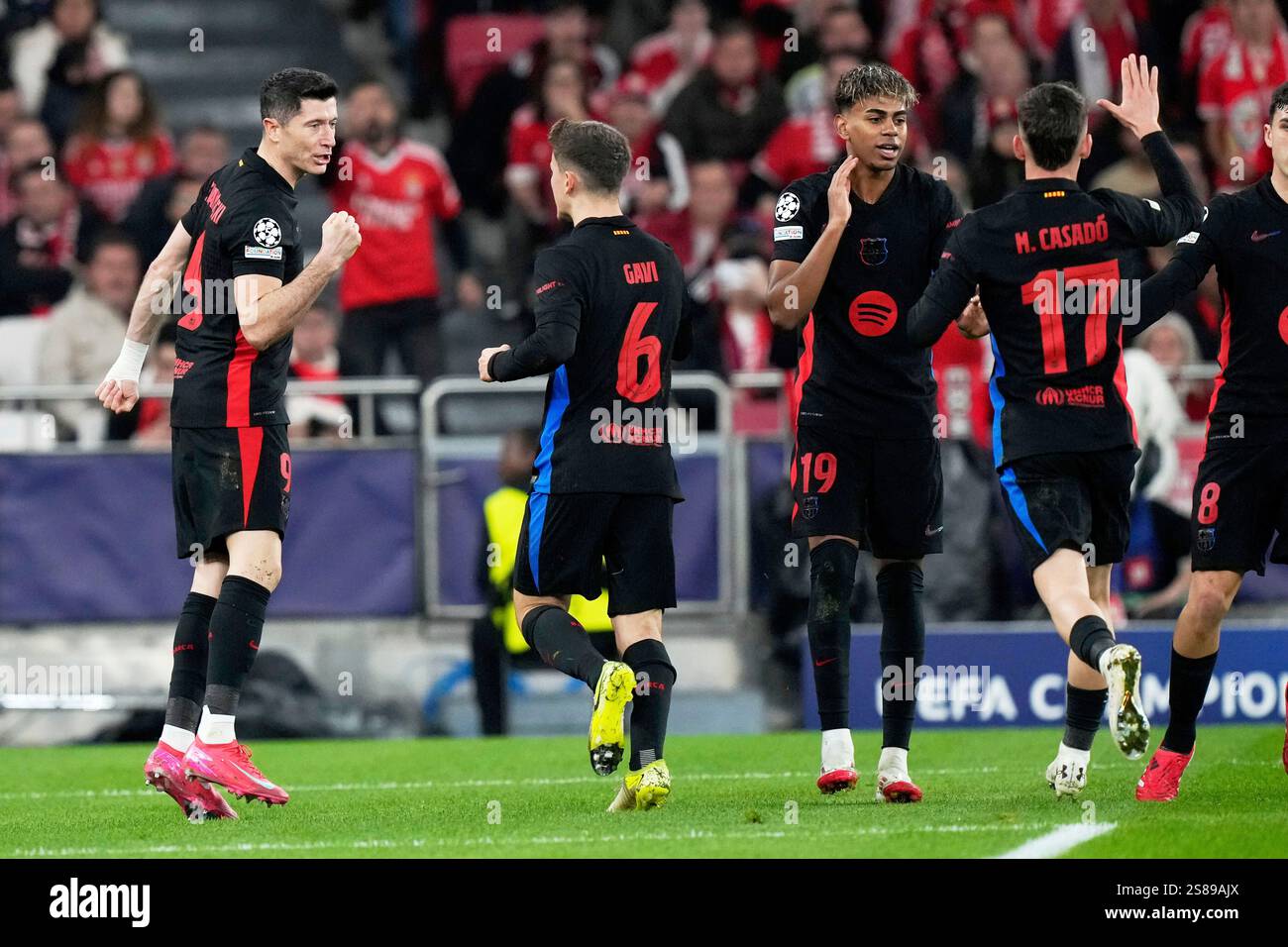 Barcelona's Robert Lewandowski celebrates his side's first goal shot ...
