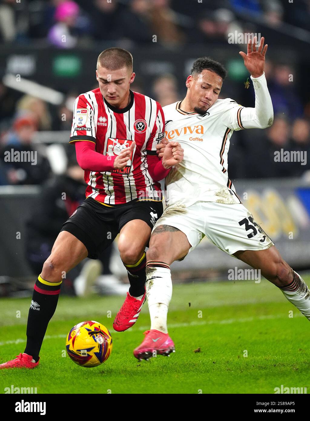 Sheffield United's Alfie Gilchrist (left) and Swansea City's Ronald ...