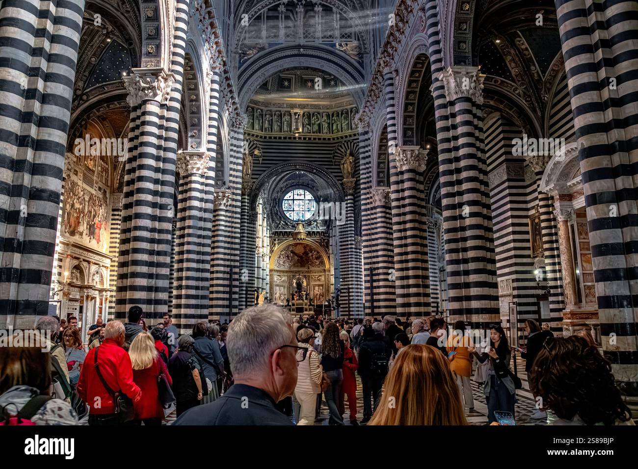 People admiring the stunning interior of Siena Cathedral a 13th-century ...