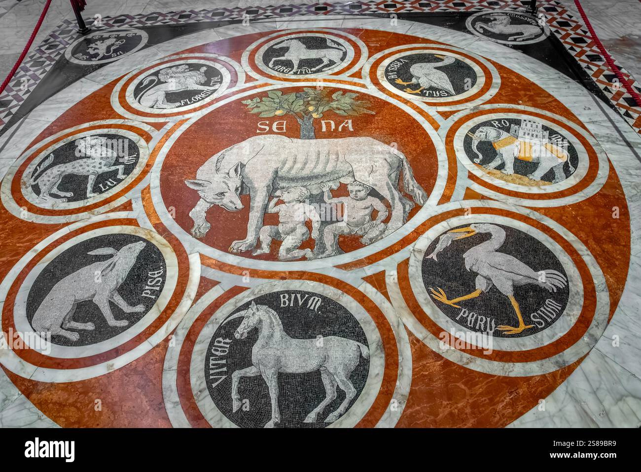 A tile mosaic showing the emblem of Siena in the centre and other ...