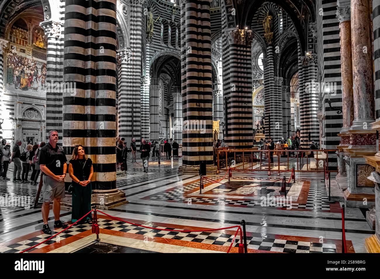 People admiring the stunning interior of Siena Cathedral a 13th-century ...