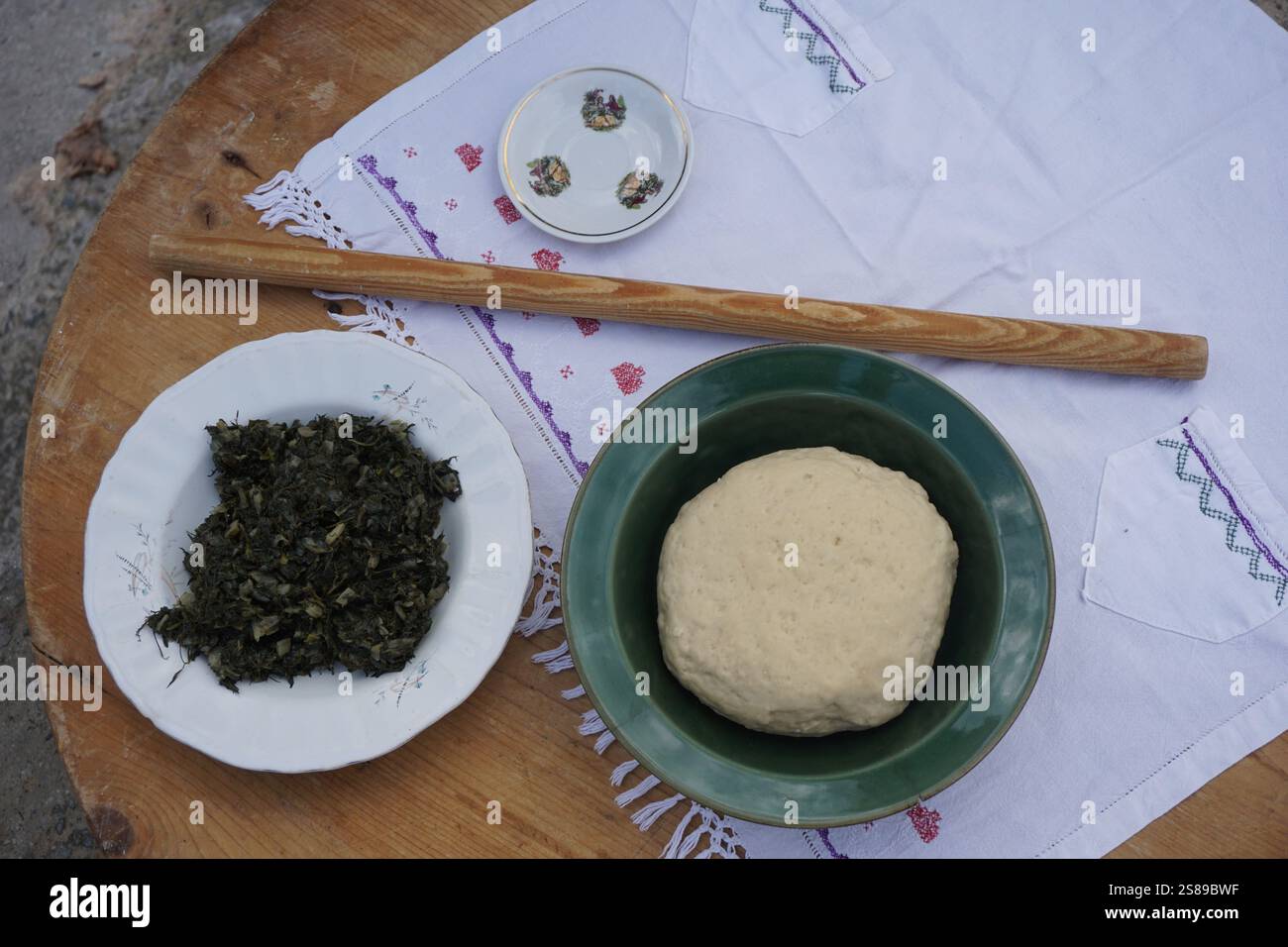 Everything ready on the table to make Cretan green pies: handmade and ...