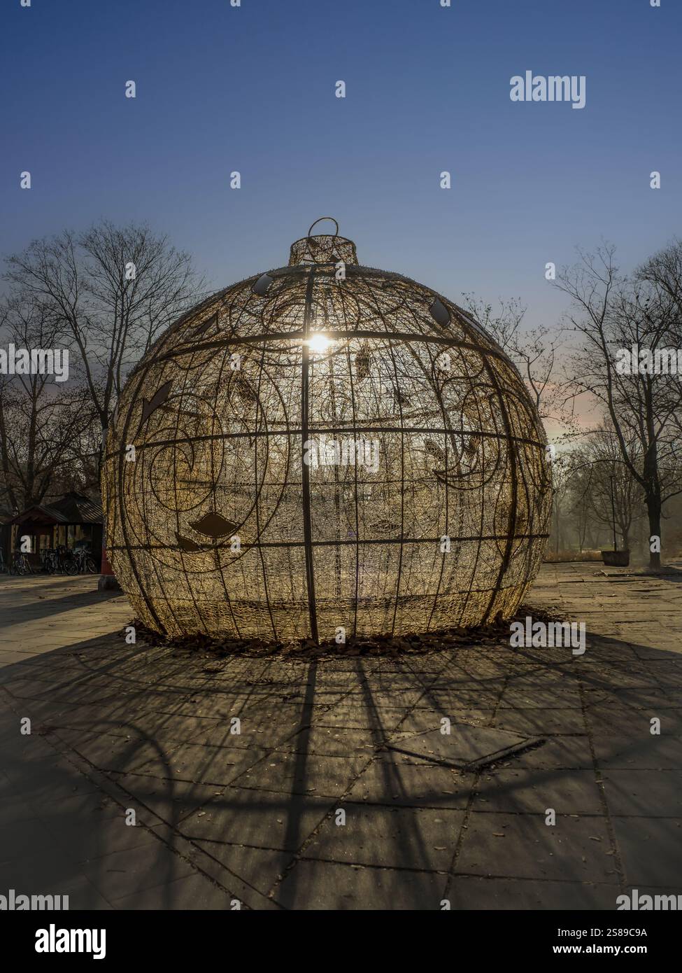 Golden metal structure in the shape of a decorative christmas ball ...