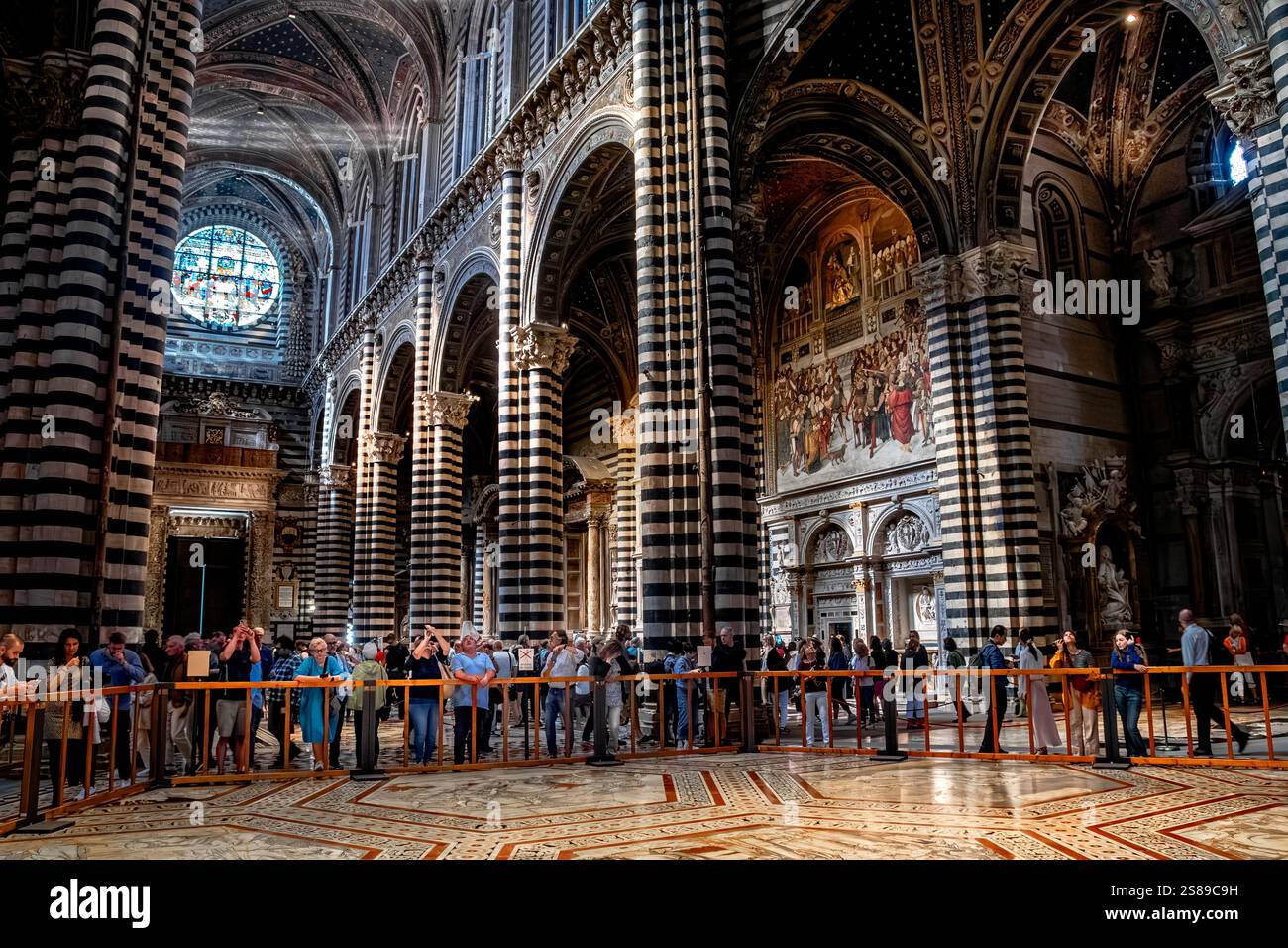 People admiring the stunning interior of Siena Cathedral a 13th-century ...