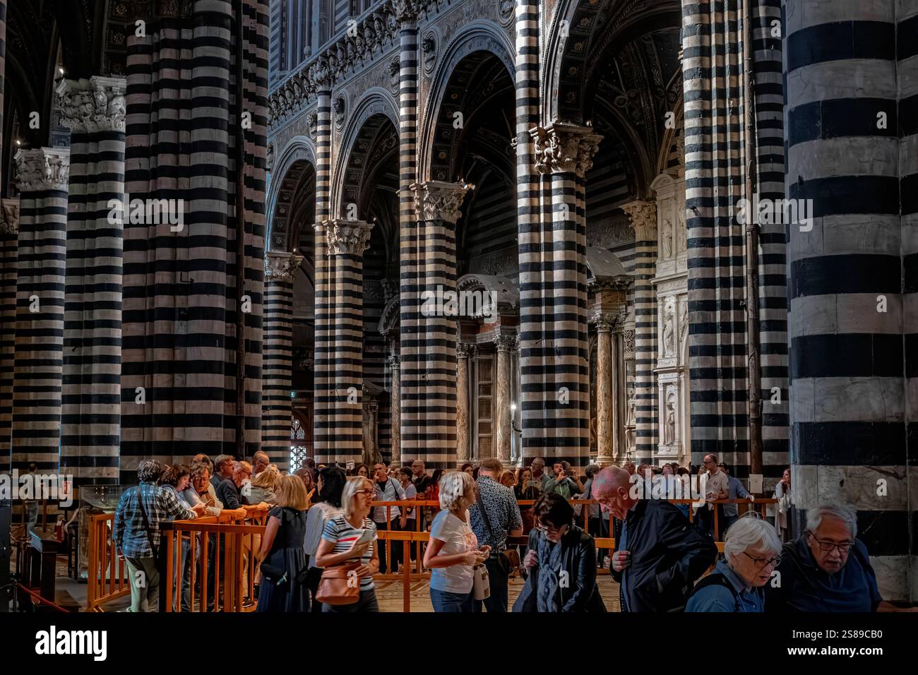 People admiring the stunning interior of Siena Cathedral a 13th-century ...