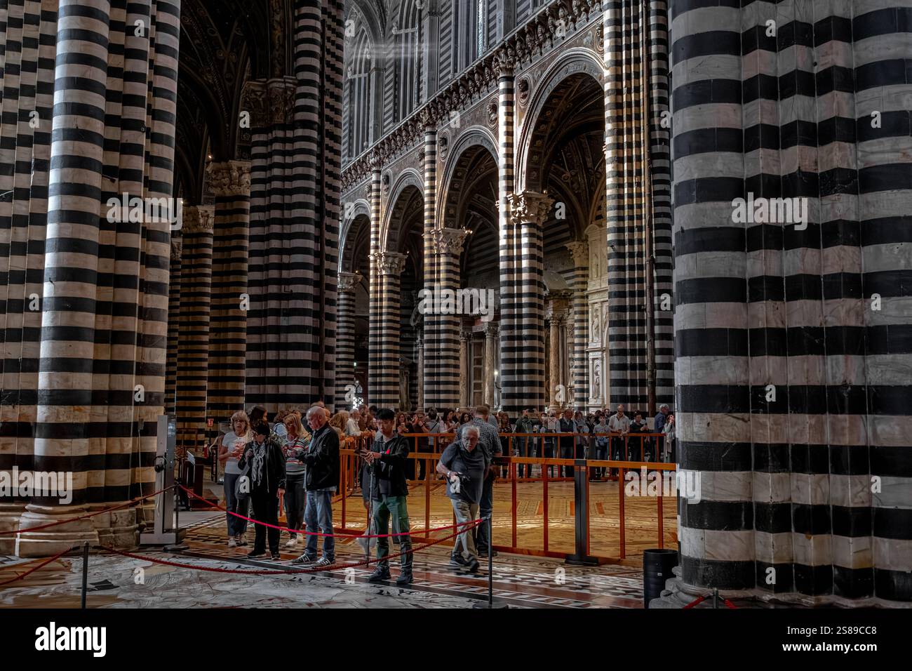 People admiring the stunning interior of Siena Cathedral a 13th-century ...