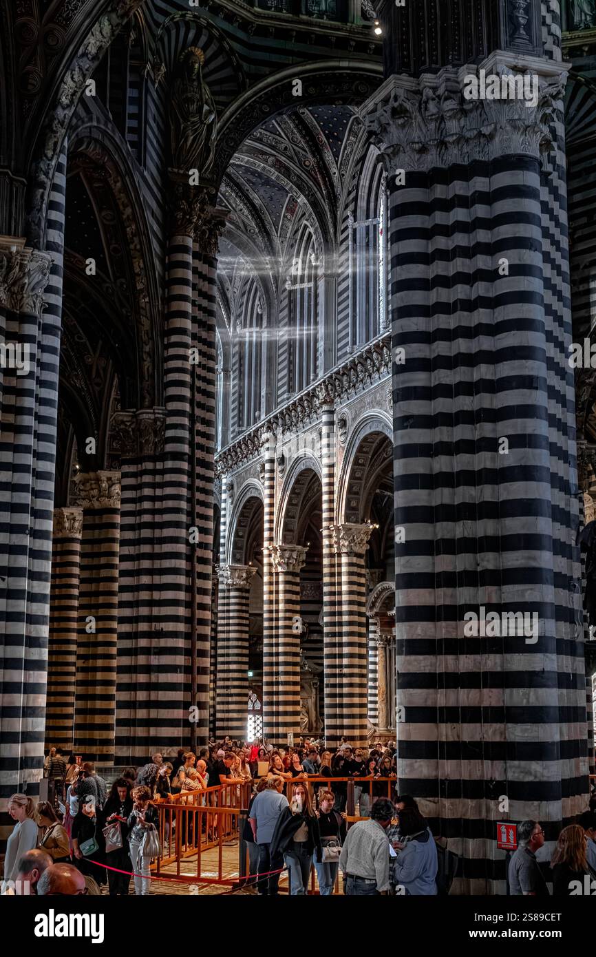 People admiring the stunning interior of Siena Cathedral a 13th-century ...
