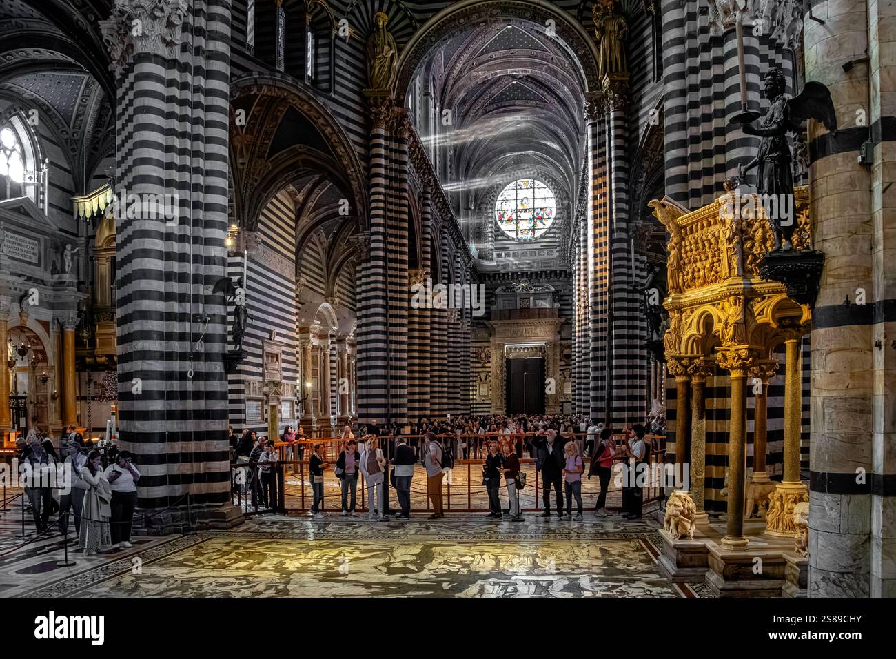 People admiring the stunning interior of Siena Cathedral a 13th-century ...