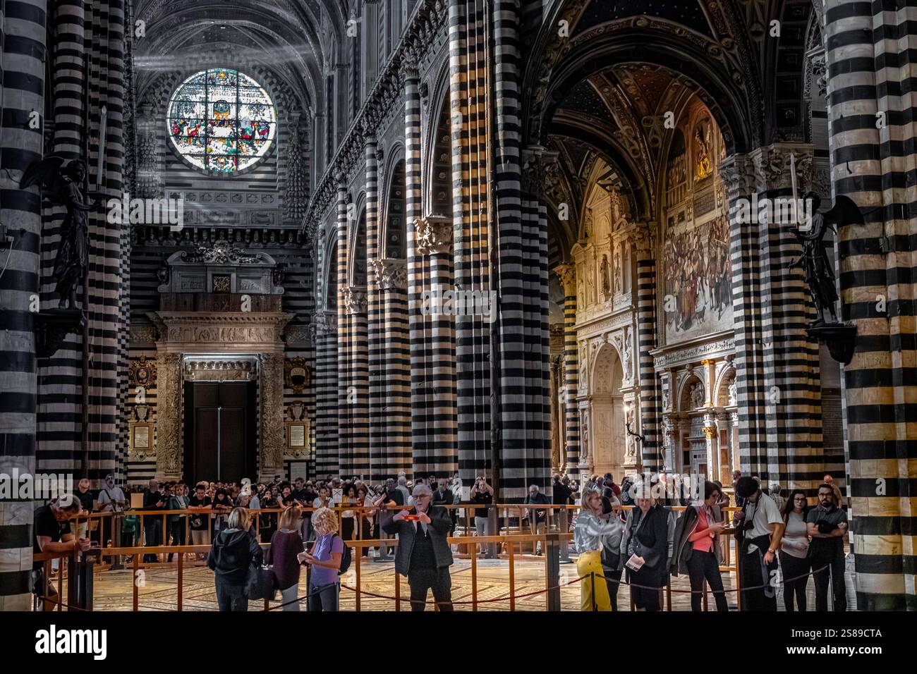 People admiring the stunning interior of Siena Cathedral a 13th-century ...