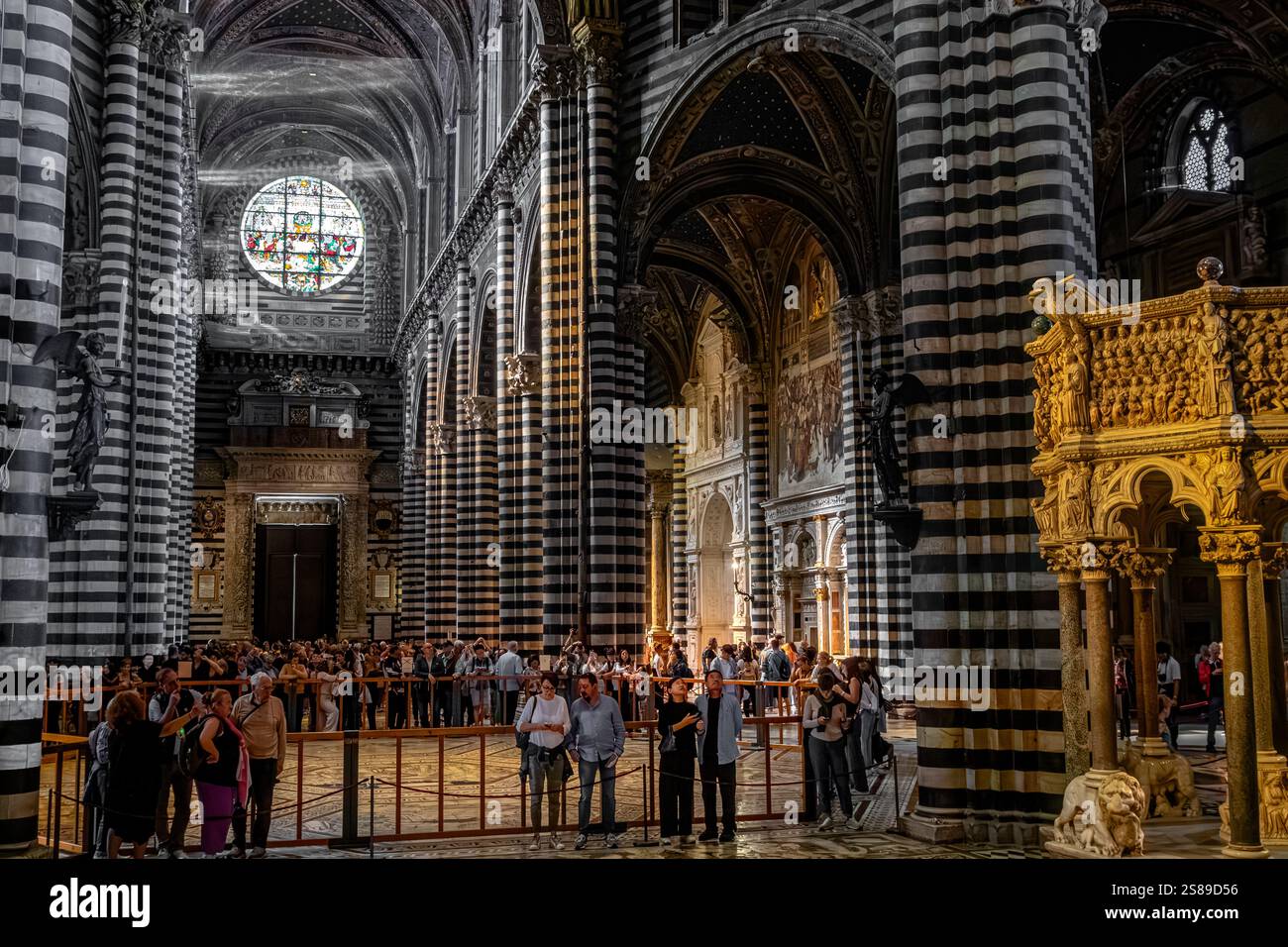 People admiring the stunning interior of Siena Cathedral a 13th-century ...